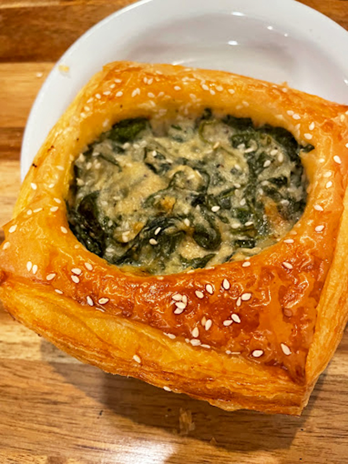 This spinach and feta creation proves that vegetables can indeed be indulgent when wrapped in flaky, golden pastry.