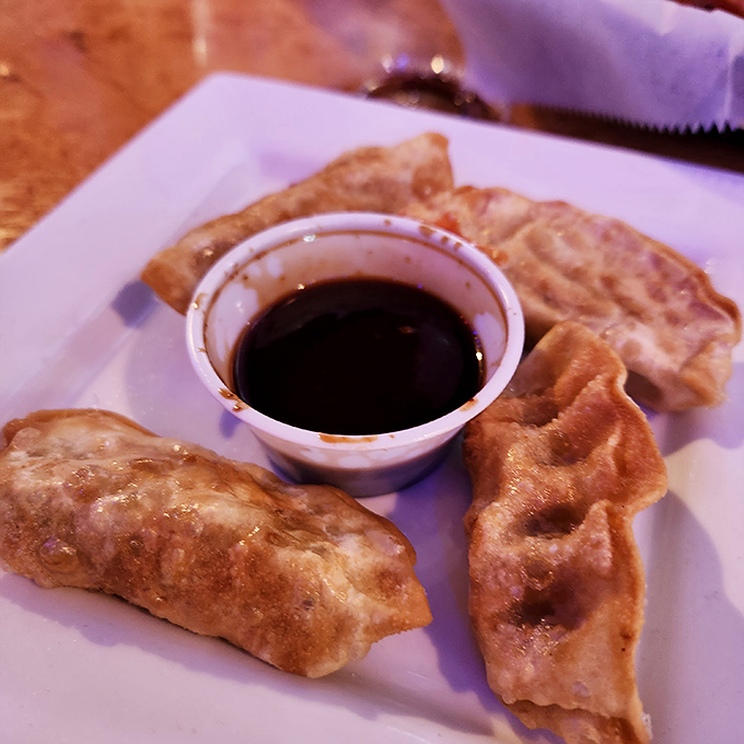 Pork potstickers with the perfect crisp-tender contrast &ndash; these little pockets of flavor with dipping sauce prove Ruben James excels beyond burgers.