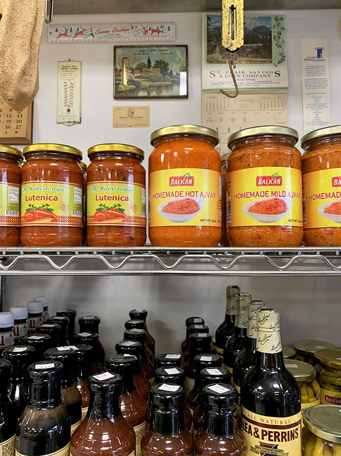 The supporting cast &ndash; jars of lutenica and ajvar stand ready to elevate your sausage experience to new heights.