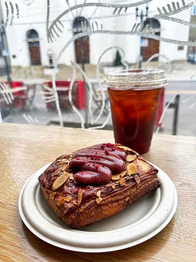 This isn't just a pastry &ndash; it's architecture in food form, with layers of buttery dough supporting a crown of raspberry and almond.