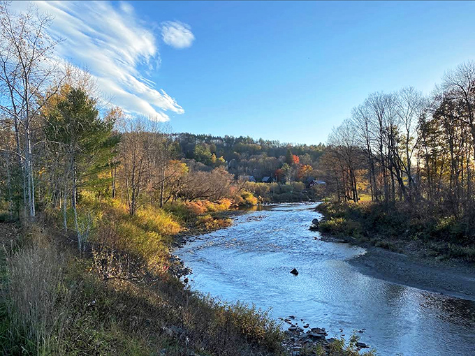 The river flows on as it has for centuries, carving its path through the landscape while painting the perfect backdrop for contemplation.