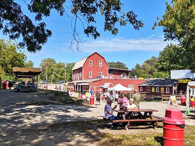 Outside Seating: Picnic tables with a view of the historic mill provide the perfect setting for savoring cider while soaking in Michigan's fall splendor.