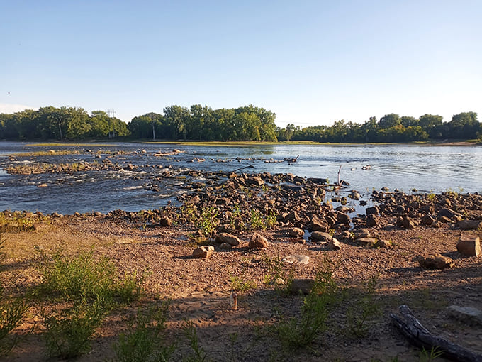 When the water level drops, the river reveals its rocky bones, creating a completely different landscape that changes with the seasons.