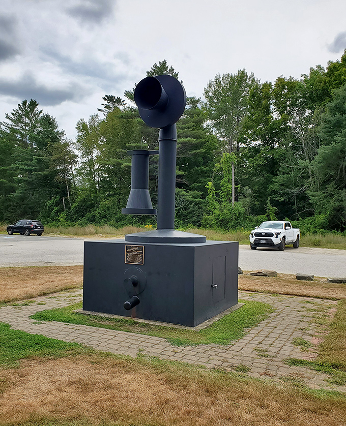 At midday, the telephone's shadow creates an interesting pattern on the ground, a sundial of sorts for the telecommunications age.