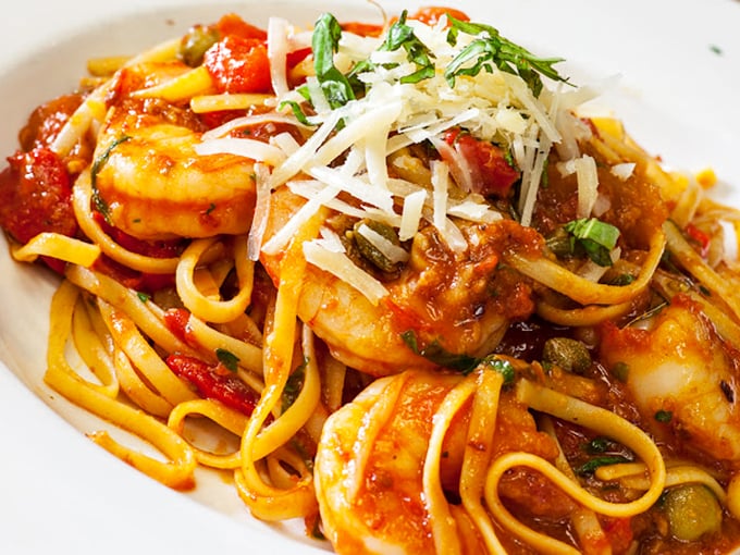 Pasta perfection meets seafood sensation! This dish has more layers of flavor than a Shakespeare play, and it's twice as satisfying. 