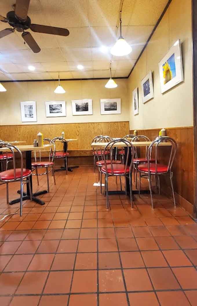 Simple tables and red vinyl chairs create an unpretentious space where the food takes center stage and conversation flows freely always.