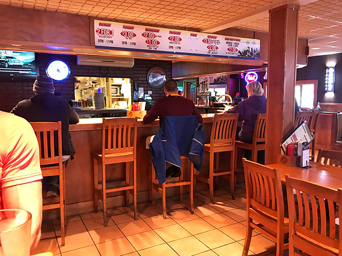 Bar seating provides the perfect perch for solo diners and regulars who know that good burgers taste even better with cold beer.
