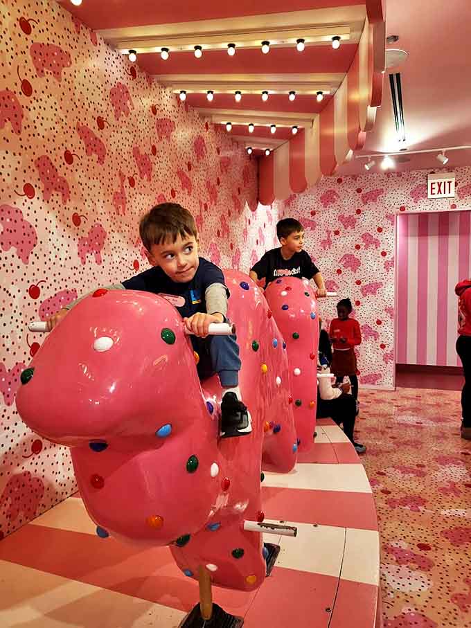 Young visitors (and young-at-heart adults) bounce with glee on these sprinkle-covered ice cream scoop rocking horses.