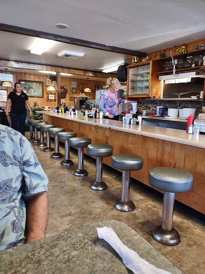 Behind the counter is where the magic happens&mdash;efficient movements from staff who've turned comfort food into an art form.