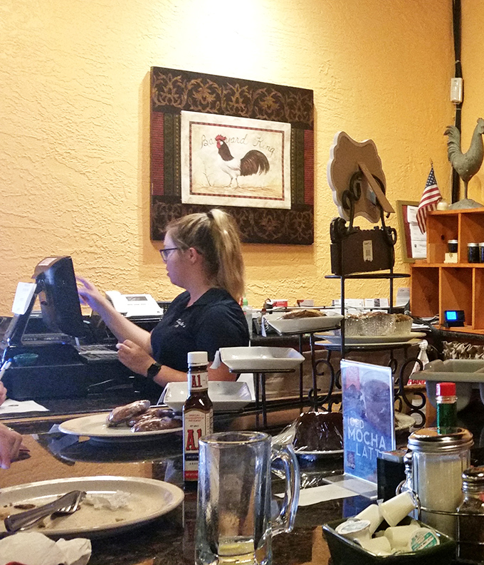 Behind the counter, friendly staff keep the coffee flowing and orders moving with the efficiency that comes from genuine hospitality.