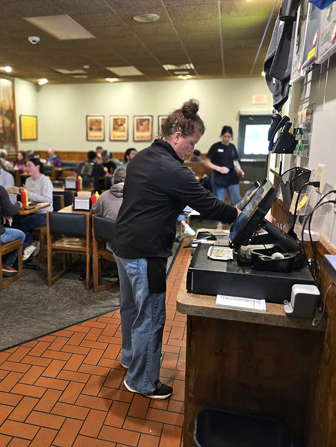 Friendly staff keeping the burger assembly line moving with efficiency and genuine smiles, because good service matters as much as good food.