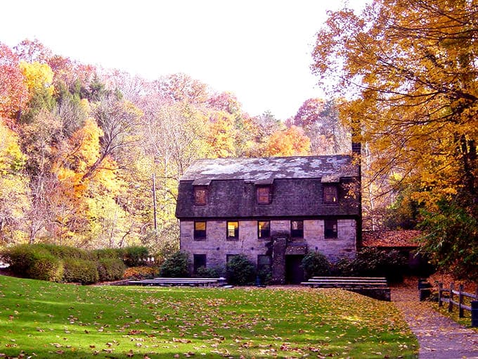 This historic stone house has witnessed more seasons than most family trees can trace, standing stoic against time's relentless march.