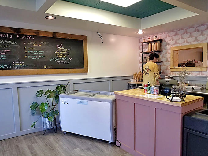 The pink and wood counter area manages to be both Instagram-worthy and functional, proving that pretty spaces can still serve a purpose beyond photo opportunities.