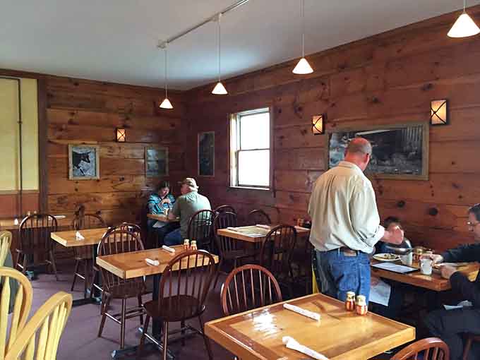 Diners enjoy their meals in the cozy interior, where the only thing better than the ambiance is what's on the plates.