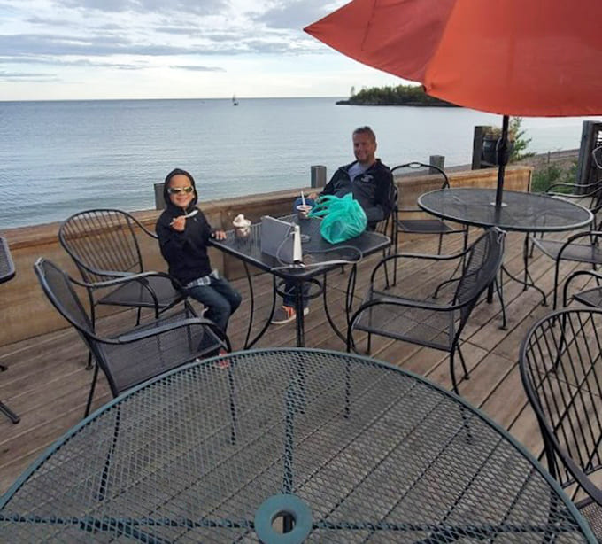 Dining with a Lake Superior view means your pizza comes with a side of natural beauty that no interior designer could ever replicate.