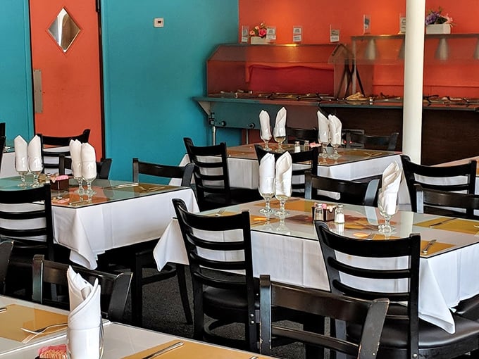 White tablecloths and warm hues create an inviting atmosphere. It's like your Indian grandmother's dining room, if she lived in Milwaukee.