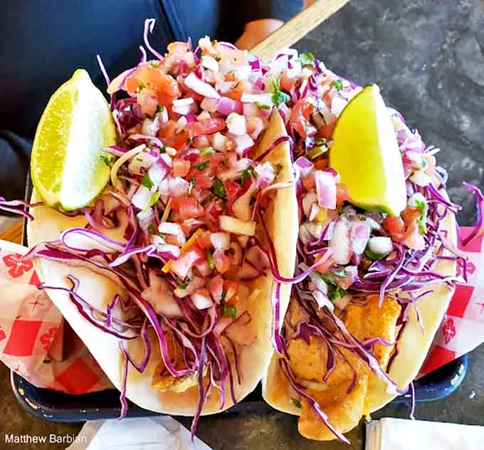 Fish tacos bursting with fresh ingredients and vibrant colors – a fiesta of flavors that brings unexpected zest to northern Michigan.