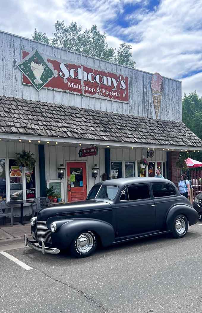 Schoony's serves up pizza and nostalgia in equal measure, with a vintage car out front just to make the point crystal clear.