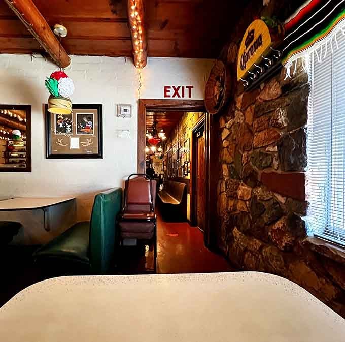 Cozy booths and warm lighting create intimate spaces for sharing stories, laughter, and probably fighting over the last bite of cheese crisp.