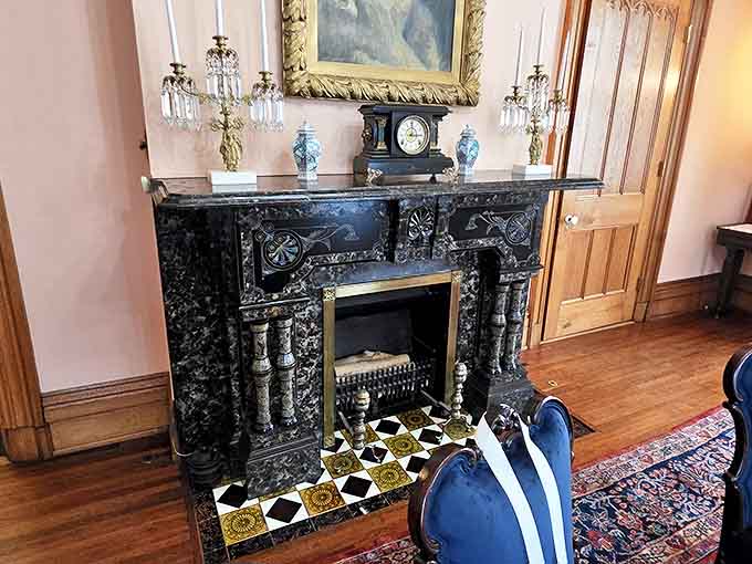 This ornate marble fireplace wasn't just for warmth &ndash; it was the Victorian equivalent of a home entertainment center where families gathered on winter evenings.