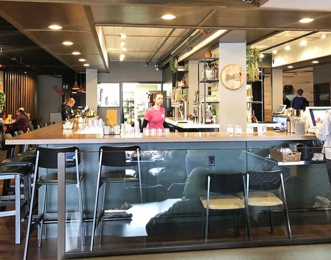 The bar area gleams with possibility, ready to craft whatever beverage will complement your perfect meal.