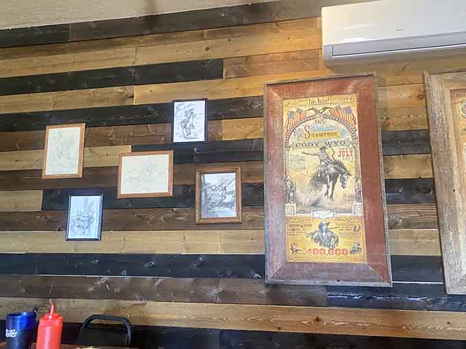 Vintage rodeo posters and Western memorabilia remind you that you're dining in authentic Arizona mountain country, not some themed chain.
