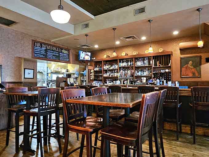 The mix of booths and tables offers seating options for every group size and mood, from intimate dinners to larger gatherings.