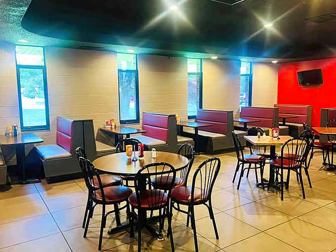 Bright booths and plenty of natural light make this dining area feel fresh and inviting, perfect for a leisurely meal with family.