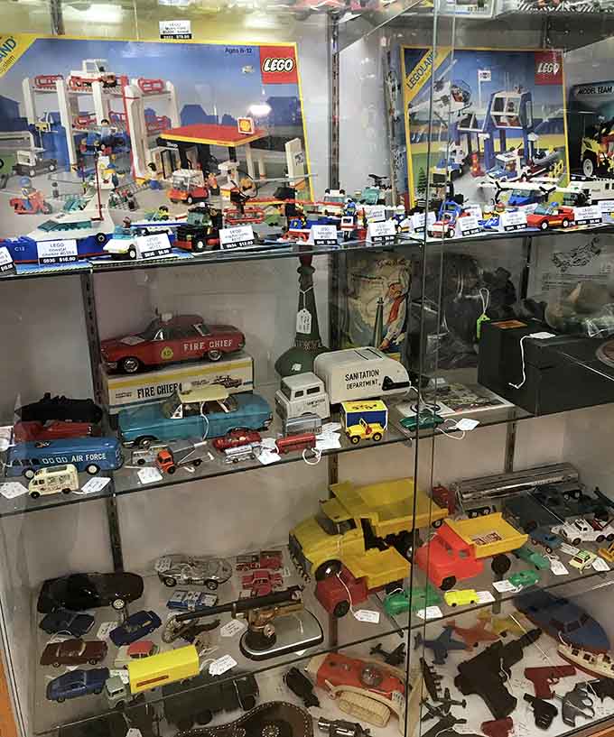Toy cars and LEGO sets from decades past, when childhood meant building things yourself and using actual imagination daily.
