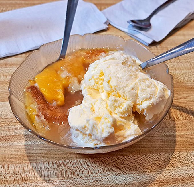 Warm peach cobbler meets cold ice cream in this bowl of contrasts that proves opposites don't just attract &ndash; they create dessert perfection.