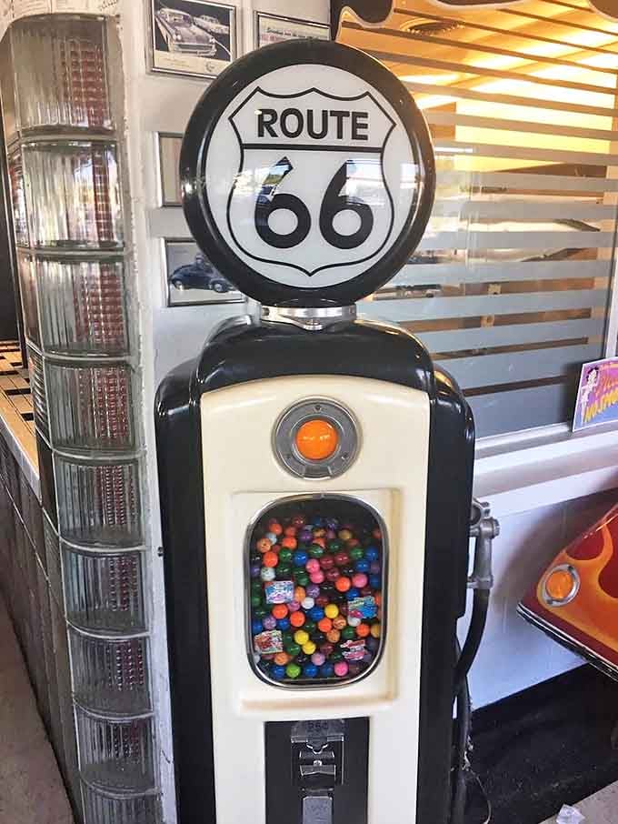 Even the gumball machine is vintage here, dispensing nostalgia one colorful sphere at a time for lucky visitors.