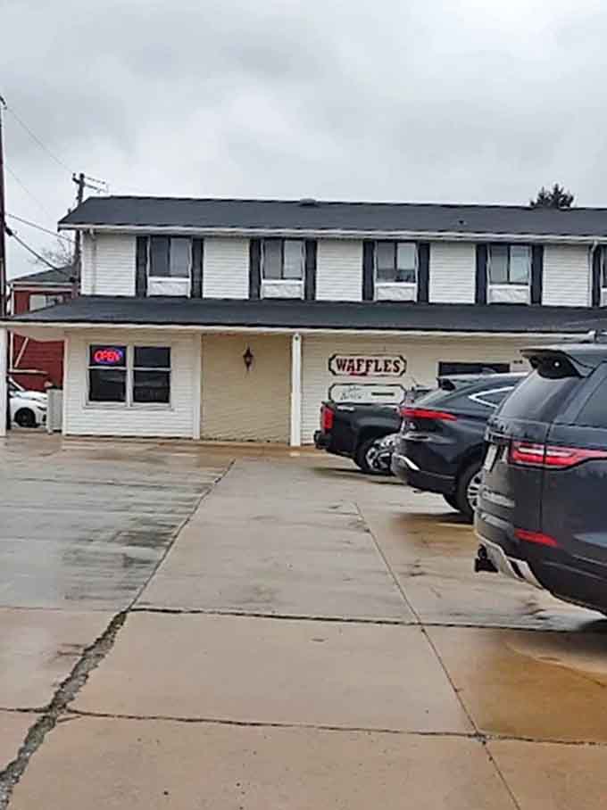 Parking Area: The humble exterior belies the culinary treasures within &ndash; proof that sometimes the best experiences hide in plain sight.