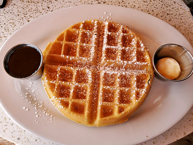 Waffle wonderland! This golden grid of goodness is waiting to syrup-titiously steal your heart.