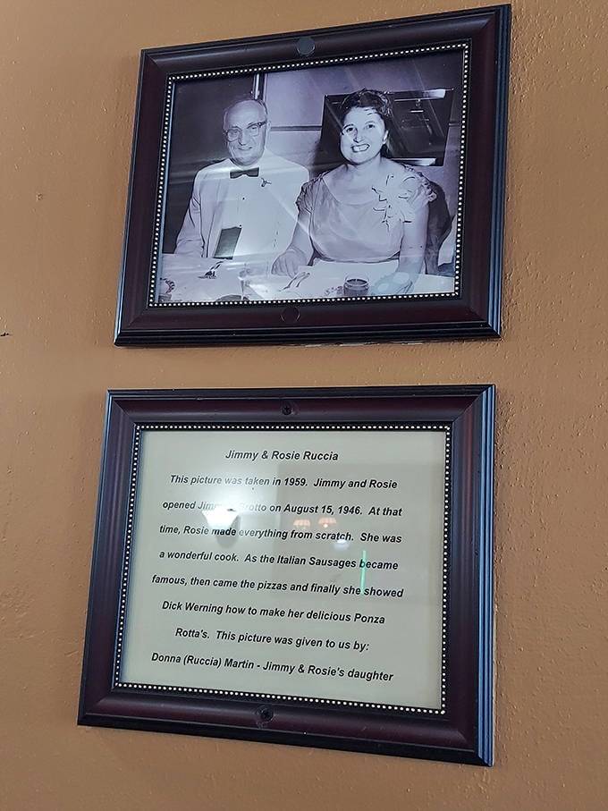 A glimpse into history with framed photos telling the story of Jimmy's Grotto, preserving the legacy that began in 1946.