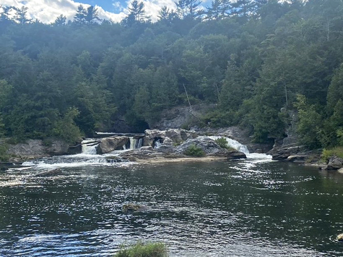 Otter Creek's cascading falls create nature's perfect soundtrack, drowning out the world beyond this secluded Vermont paradise.