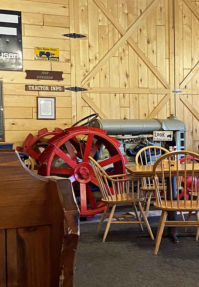 An actual tractor sits among the dining tables because why wouldn't you want farm equipment with your breakfast?