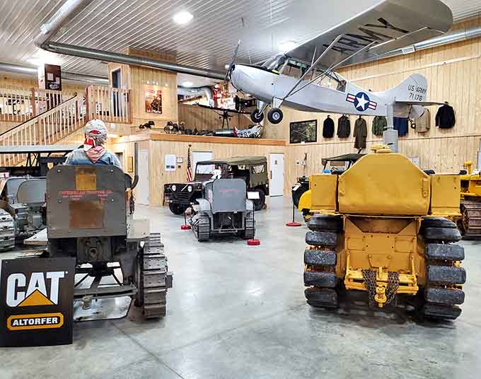 Military vehicles and vintage aircraft share space like the world's coolest history lesson, minus the pop quiz at the end.