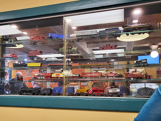 Model trains circling overhead add whimsy and nostalgia, delighting kids while adults focus on more important matters, like pie.