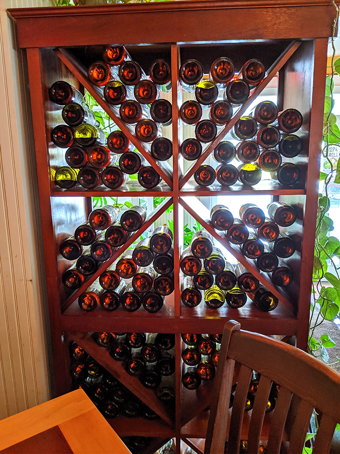 The wine rack isn't just storage &ndash; it's a stained-glass window of possibilities, each bottle promising a different journey.