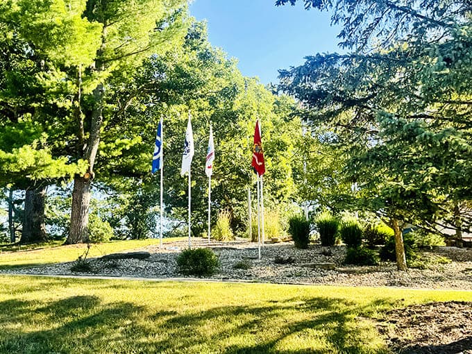 Flags wave proudly in the veterans memorial area, honoring those who served while visitors enjoy the freedoms they protected.