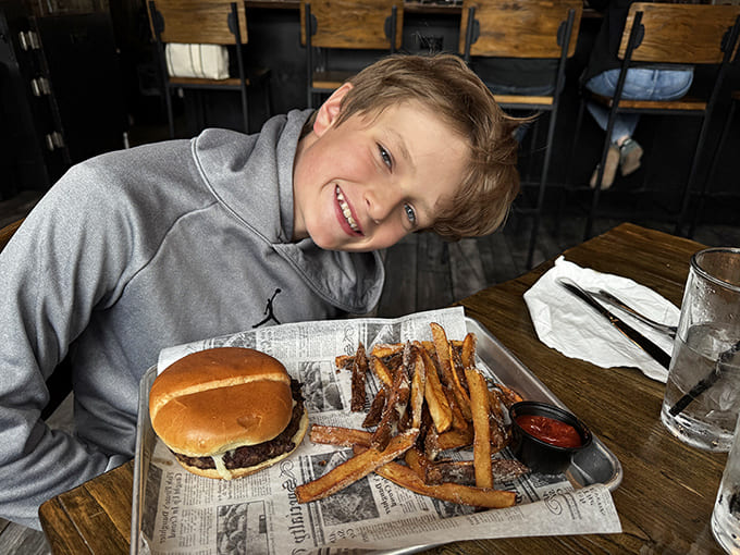 Even young diners find happiness here, with perfectly cooked burgers and fries served on newspaper-lined trays &ndash; a nostalgic touch that bridges generations.