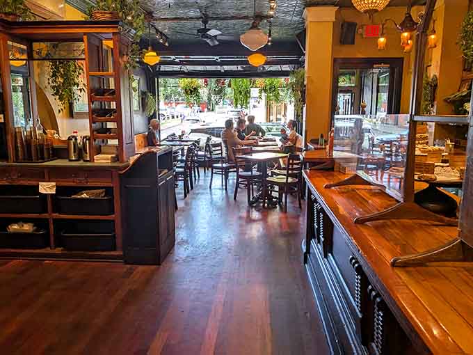 Wooden tables and mismatched seating arrangements that somehow feel more welcoming than any designer showroom ever could.
