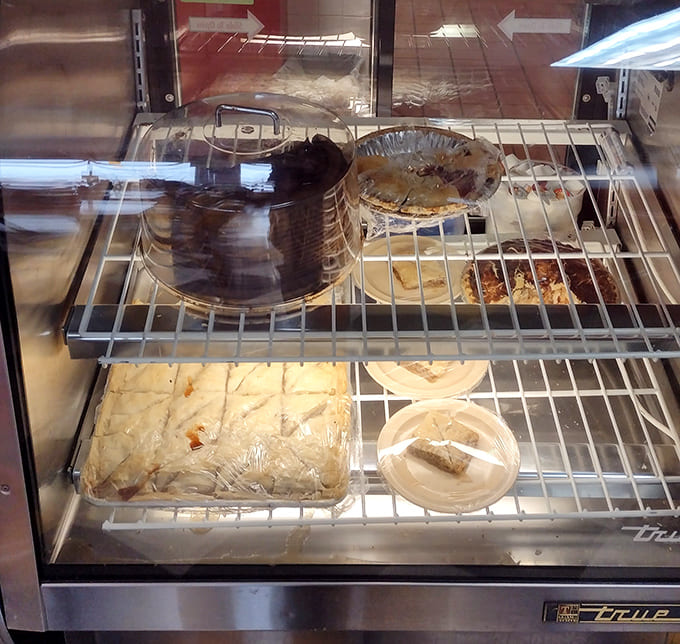 The warming station holds fresh-baked goods and ready-to-serve items, everything prepared with the same attention to detail that makes this place special.