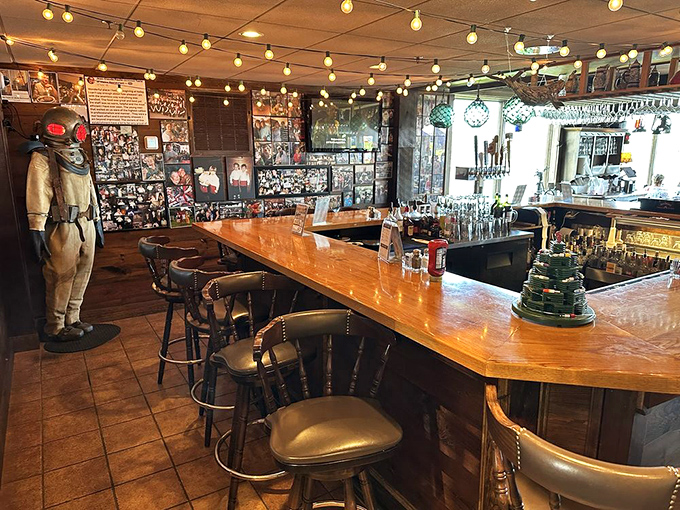The bar area feels like the world's coziest ship's cabin - nautical artifacts and tiffany lamps create the perfect maritime mood.