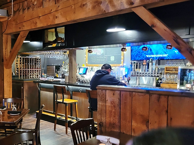 The rustic bar area invites you to linger over local craft beers and well-executed classic cocktails.