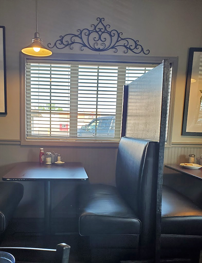 Cozy booths await, perfect for intimate conversations or solo missions to conquer the menu. Prepare for comfort overload!