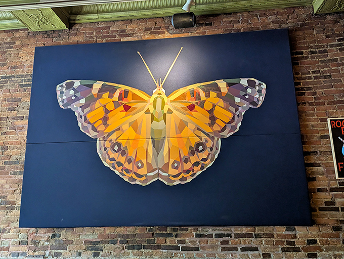 Art meets appetite &ndash; this stunning butterfly mural adds a splash of color and whimsy to the restaurant's brick-lined interior.