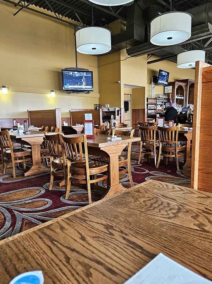 High ceilings and thoughtful lighting create a dining space that feels both spacious and intimate at the same time somehow.