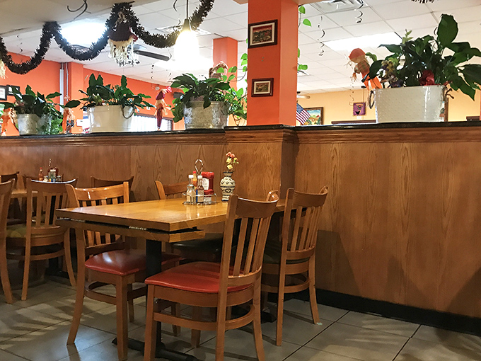 Thoughtful interior touches like plants and warm wood tones make this no-frills restaurant feel like dining in someone's welcoming home.