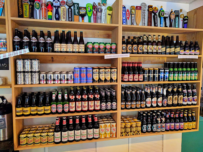 Craft beer heaven awaits with shelves showcasing local Florida brews alongside carefully selected imports &ndash; liquid art in bottles and cans.